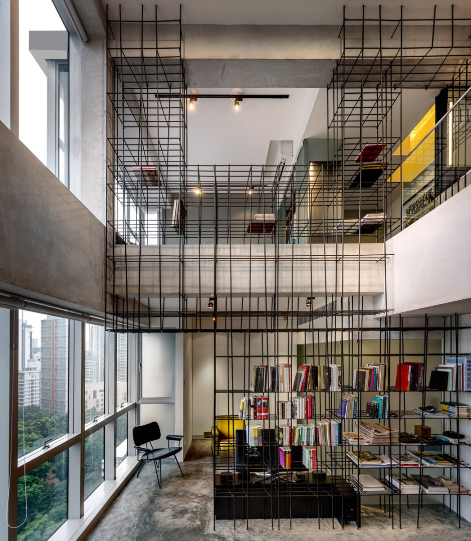 A steel cage unites the elements in this apartment