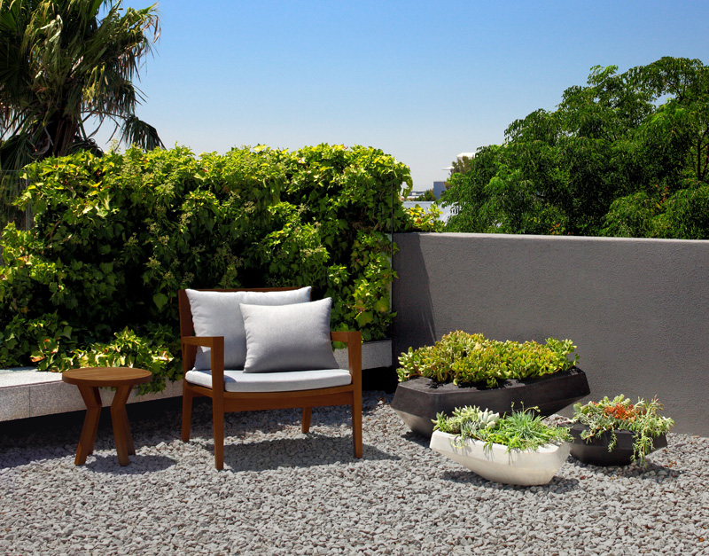 The design of these planters was inspired by jutting granite boulders ...