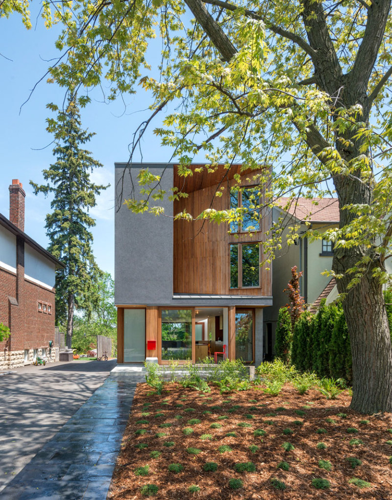 A new home for a young family on a tree-lined street in Toronto