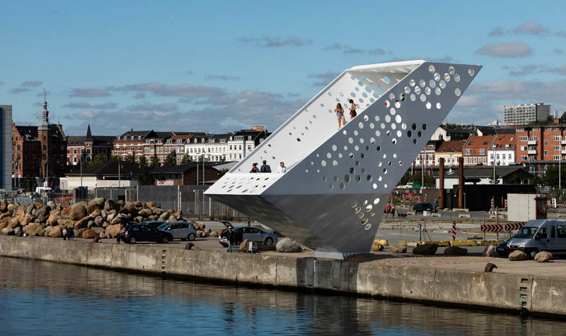A dramatic sculptural viewing tower is a new landmark for this harbor ...