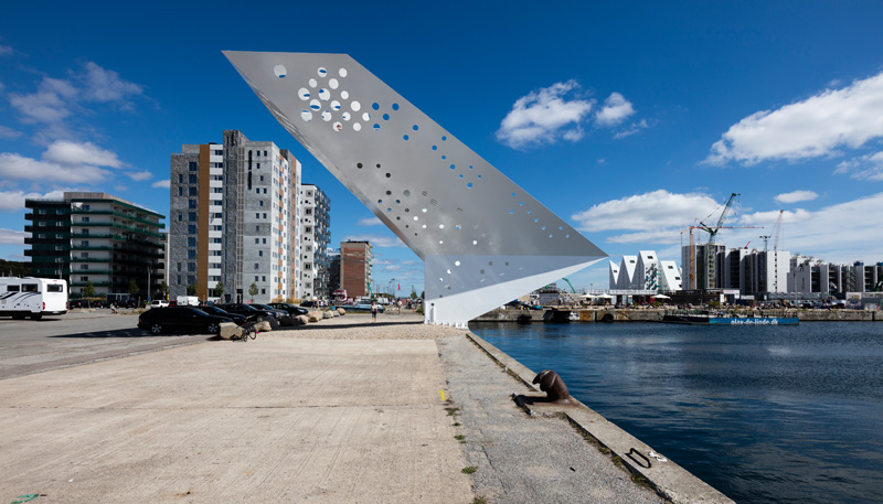 A dramatic sculptural viewing tower is a new landmark for this harbor ...