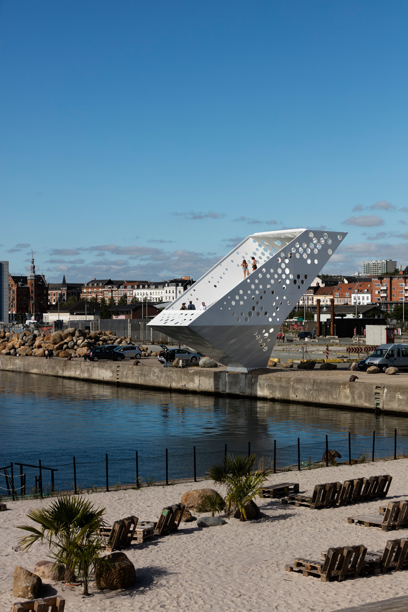 A dramatic sculptural viewing tower is a new landmark for this harbor ...