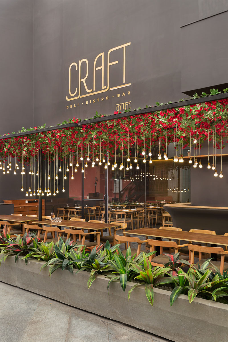 Sculptural wood elements flow from the exterior to the interior of this ...