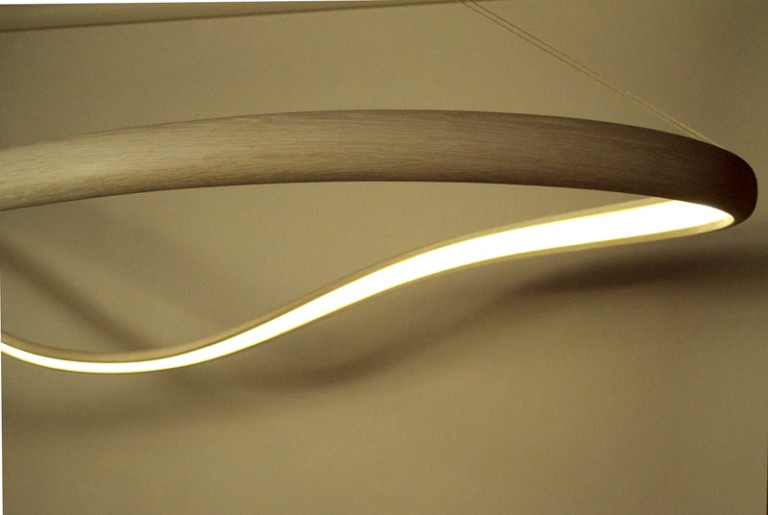 This continuous loop of bent wood emits light from embedded LEDs