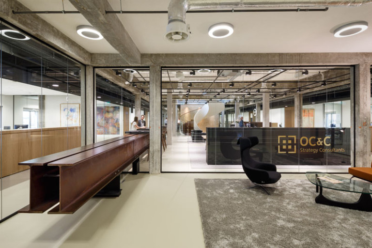 A huge I-Beam was taken from a bridge and included in this office design