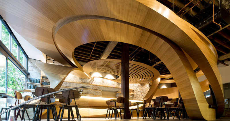 This new cafe is filled with a sculptural wood feature inspired by ...