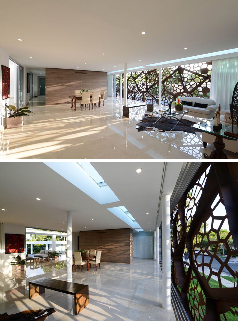 A Decorative Steel Screen Covers The Front Windows Of This Home