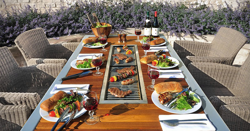 This Outdoor Table Has A Built-In BBQ Grill