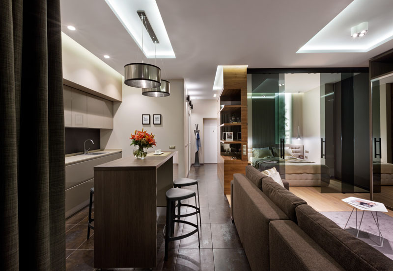 Glass Doors Define The Bedroom In This Small Apartment