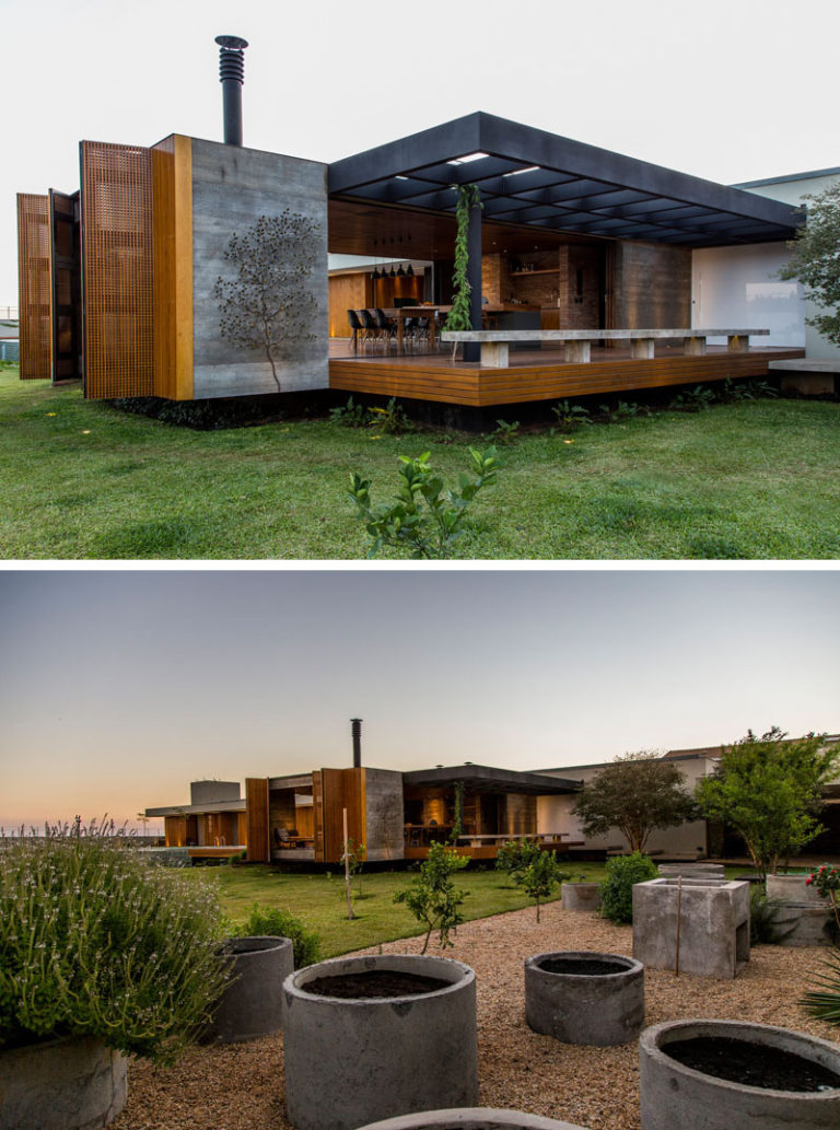 This house is a warm display of wood, concrete, stone, and steel