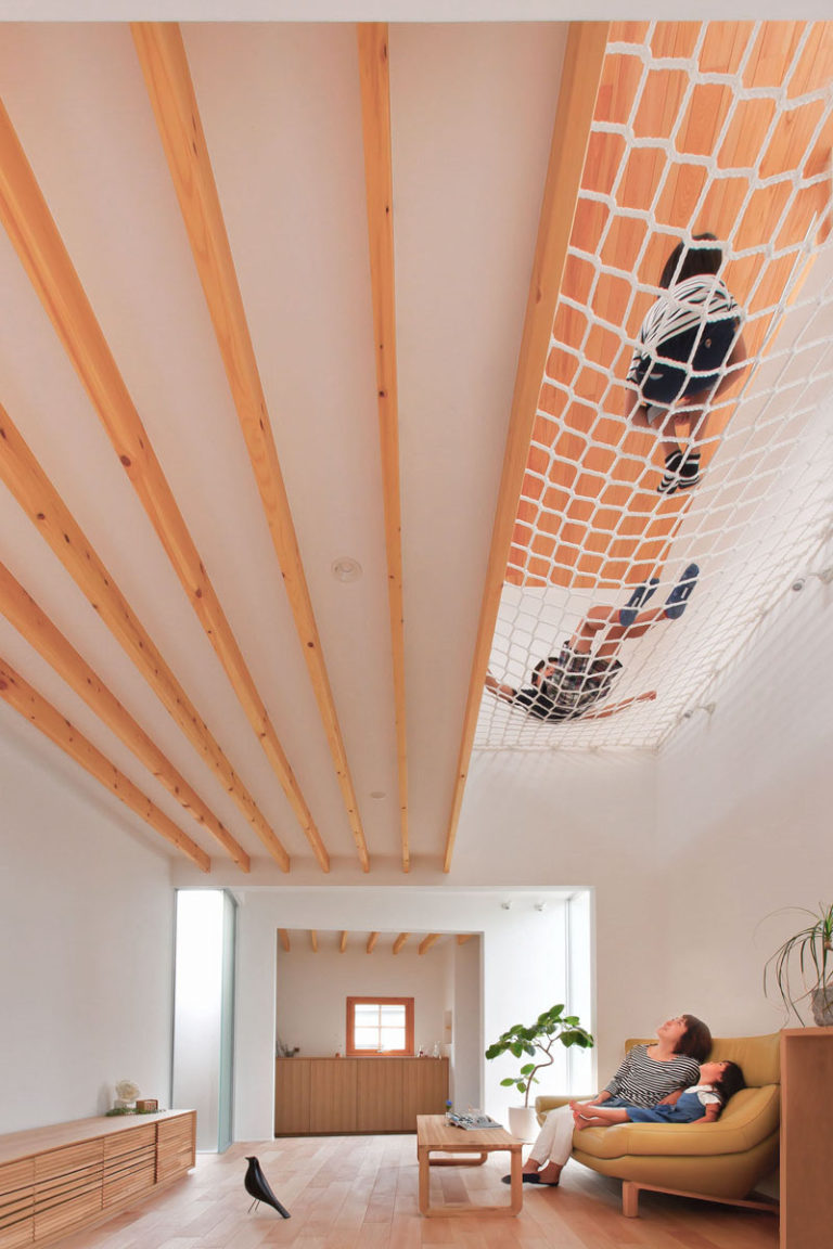 A Net Loft Hangs Above The Living Room In This Home