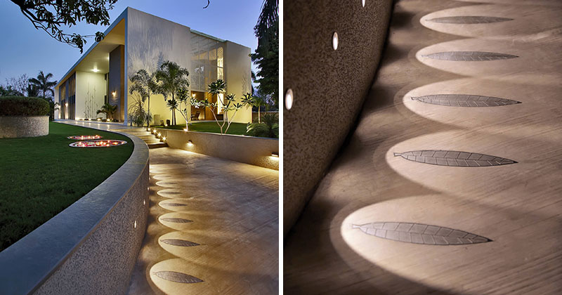 Landscaping Design Idea - Lights Highlight A Decorative Element On A Path