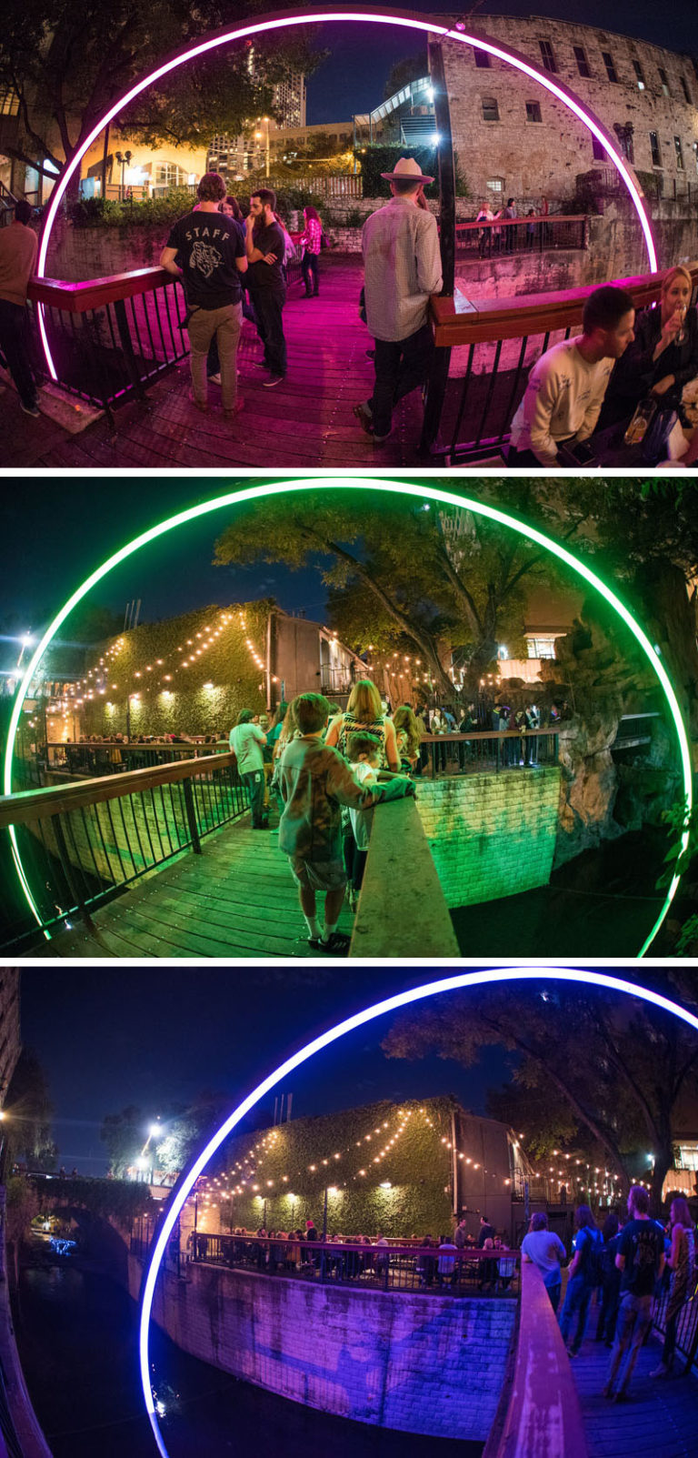This illuminated arch rises up out of the water and surrounds a foot ...