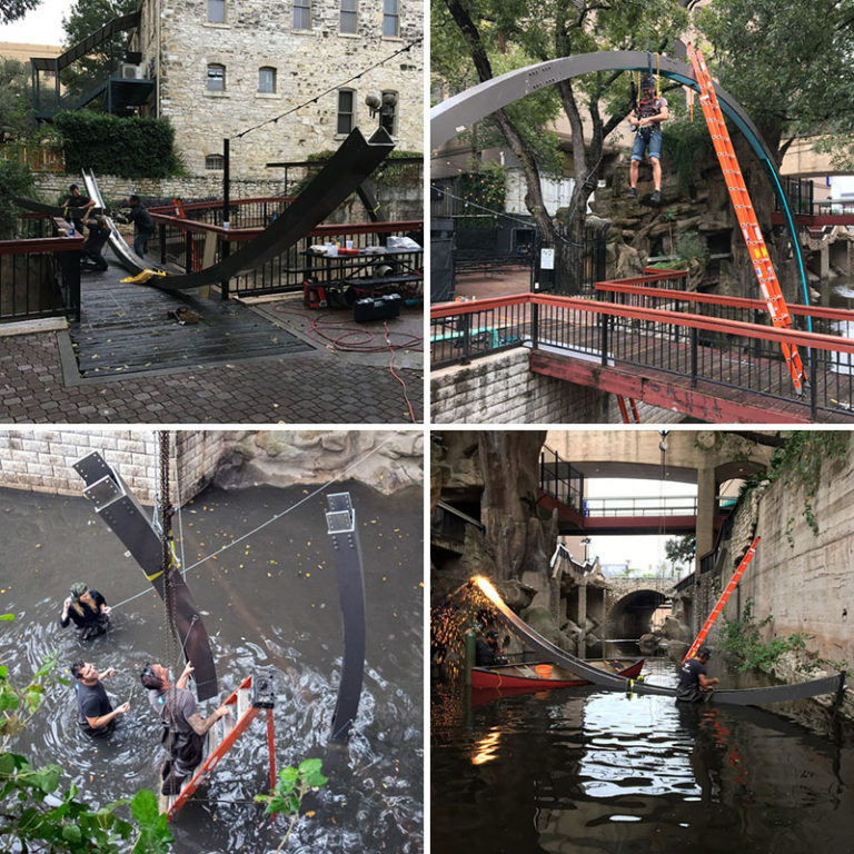 This illuminated arch rises up out of the water and surrounds a foot ...
