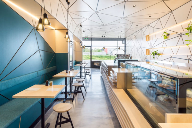 The interior of this cafe is covered in geometric panel shapes