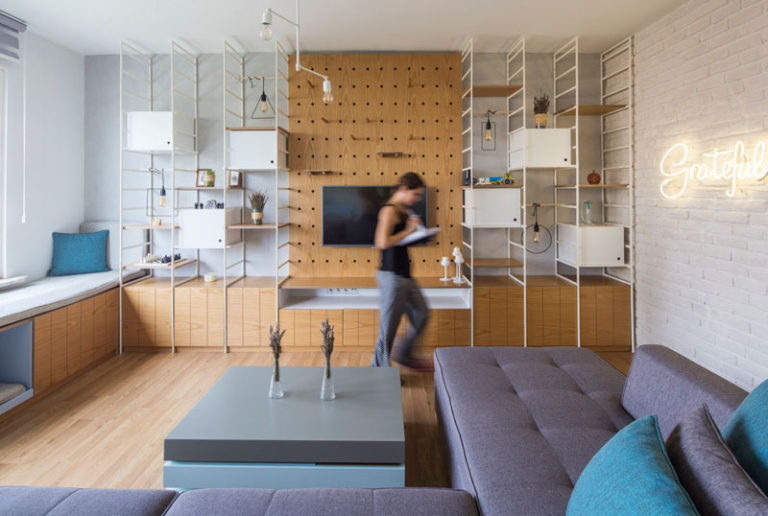 This apartment interior is filled with creative storage and decor ideas