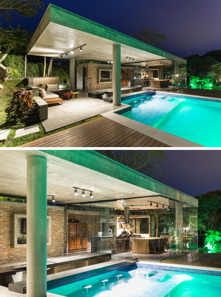 This Tropical Pool House Has A Swim Up Bar And A Glass Enclosed Dining Area