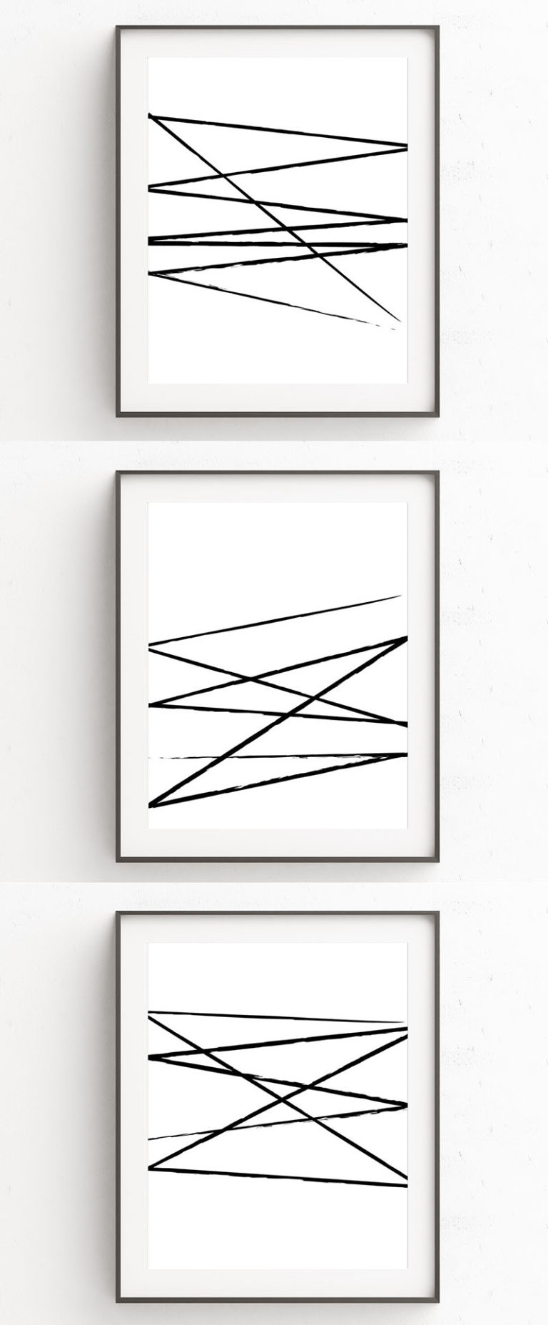 This collection of black and white art prints have brush strokes ...