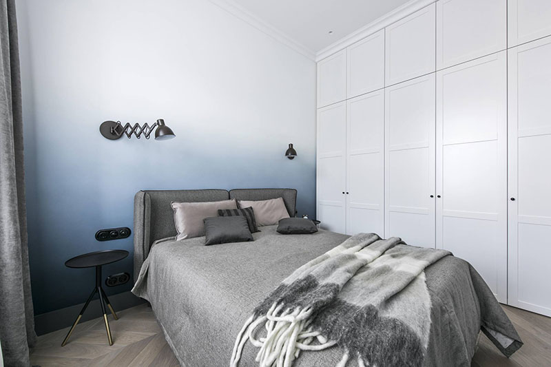 This Bedroom Has A Soft Blue Ombre Accent Wall