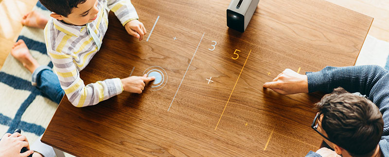 This projector turns any flat surface into an interactive touchscreen