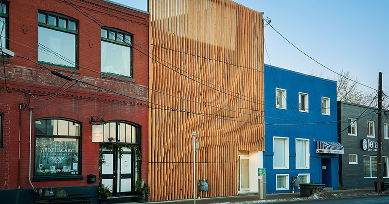 This Building Is Covered In Fins Made From 100 Year Old Reclaimed Wood
