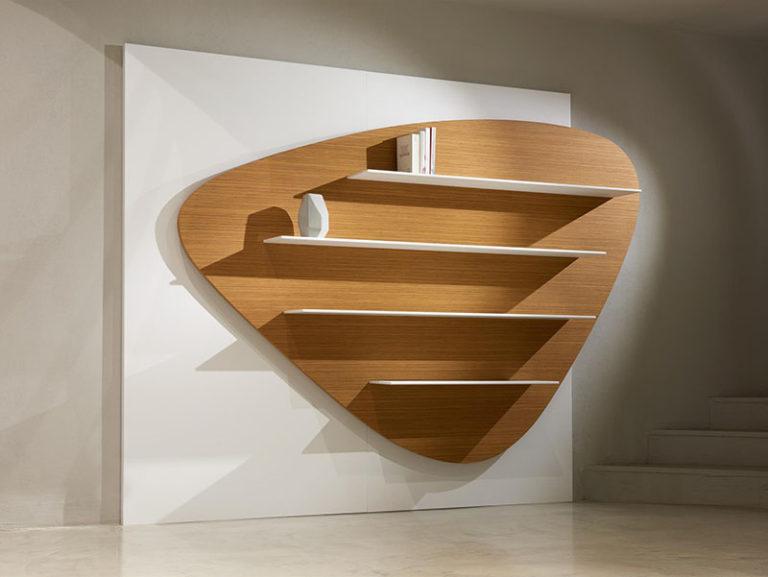 The Curved Shape Of This Bookshelf Was Inspired by Smooth Rocks
