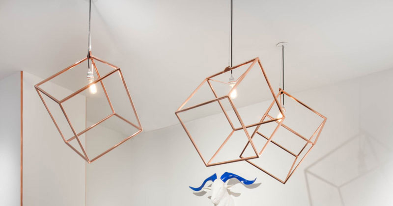 This Copper Cube Pendant Light Creates Geometric Shadows