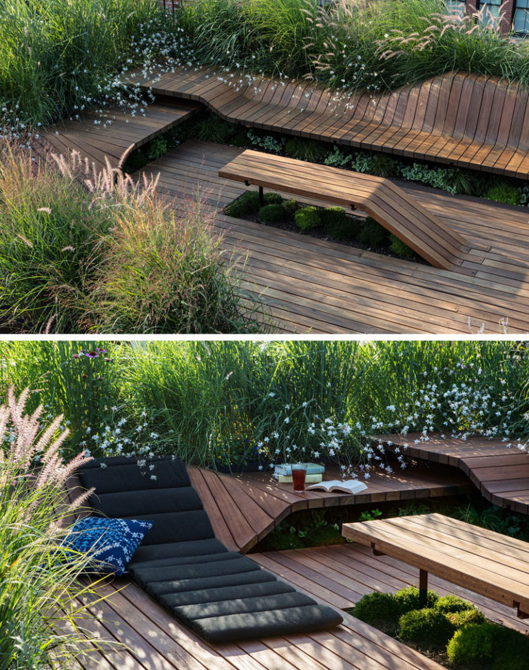This Rooftop Deck Has Custom Designed Wood Benches Surrounded By Greenery
