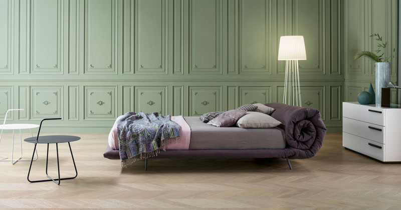 The Base Of This Bed Is Designed To Roll Up And Create A Headrest