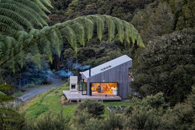 This Small House Sits On A Hillside In New Zealand