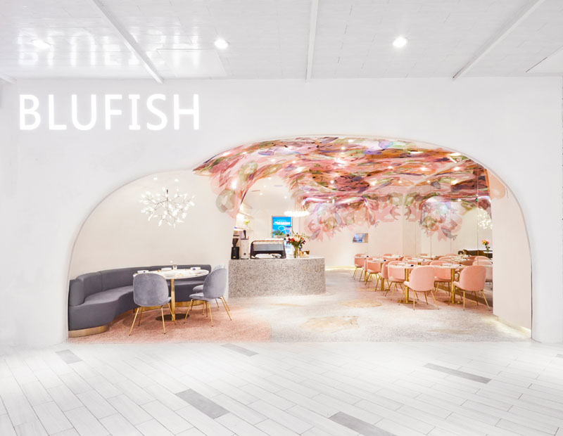 The BLUFISH Restaurant Features A Ceiling Of Colored Mesh Cut Outs That ...