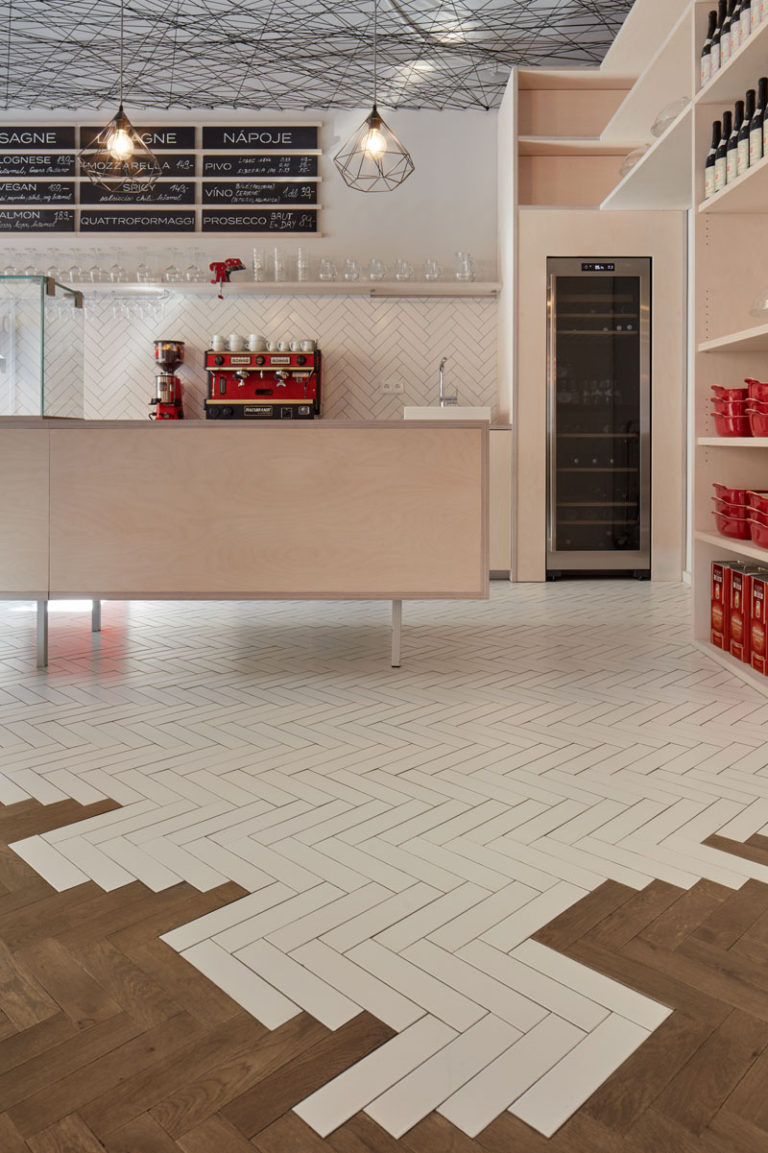 Black String Was Used To Create A Suspended Ceiling In This Bistro