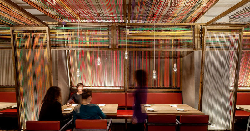 Colorful Ropes Line The Walls And Ceiling Of This Restaurant