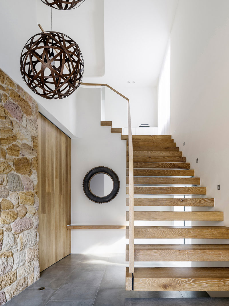 Design Detail - This Pocket Door Has A Cut Out For A Curved Floating Shelf