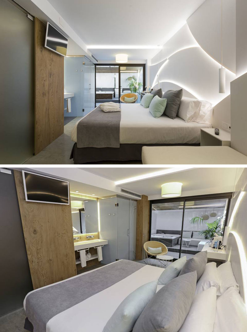 Design Detail - A Sculptural Backlit Headboard Was Added To This Hotel Room