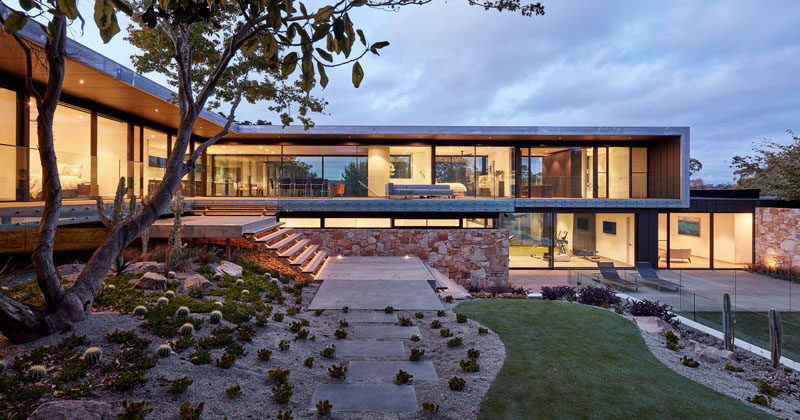 Walls Of Windows Allow This Home To Be Filled With Natural Light