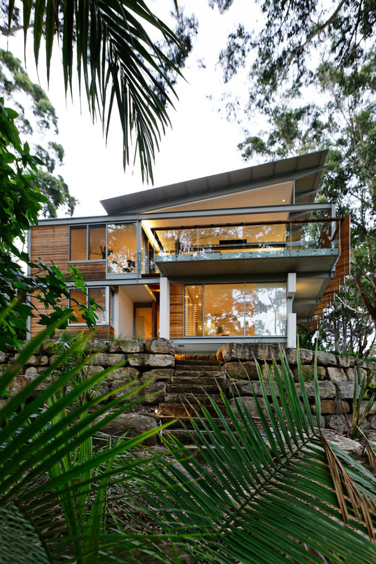This Home Surrounded By Trees Manages To Evoke The Feeling Of A Cheery ...