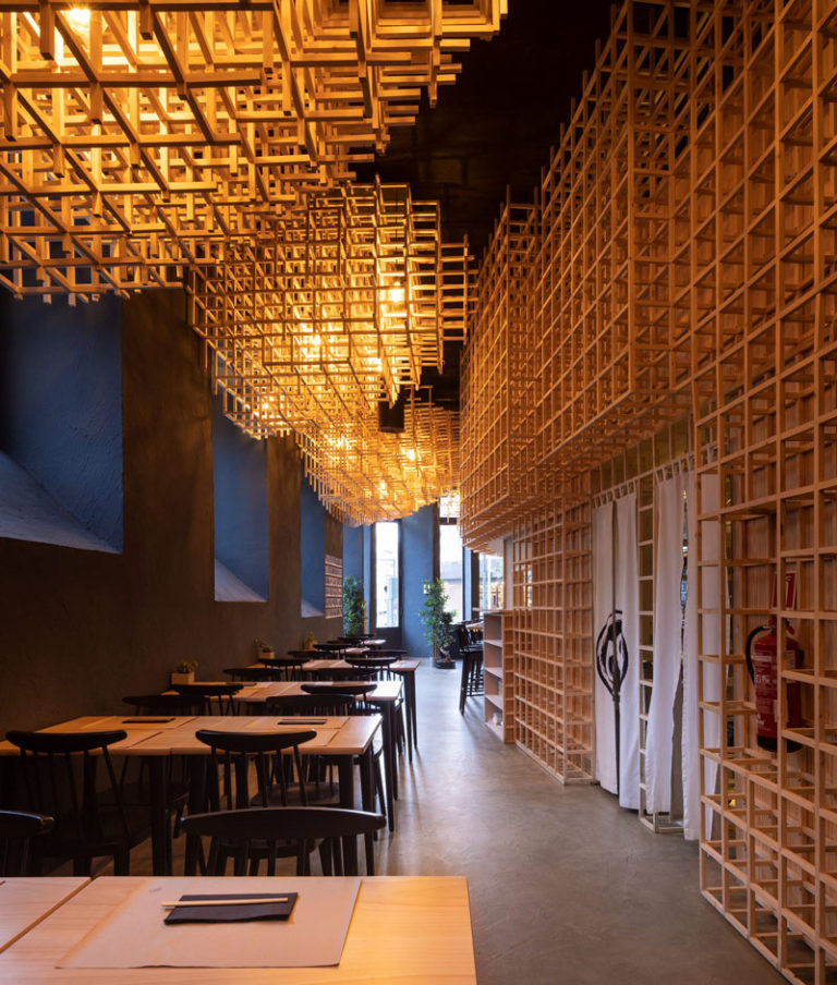 Large Sculptural Lights Create A Warm Atmosphere In This Ramen Restaurant