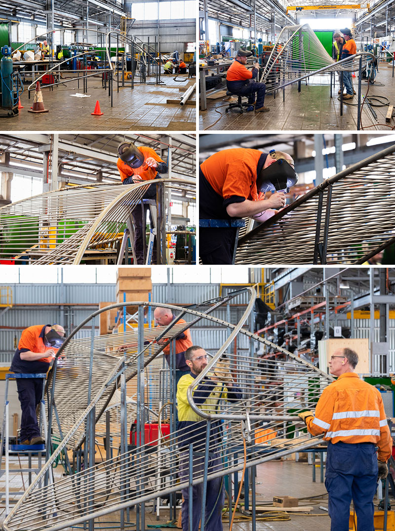 Two Suspended Sculptures Hang In The Lobby Of A New Building In Melbourne