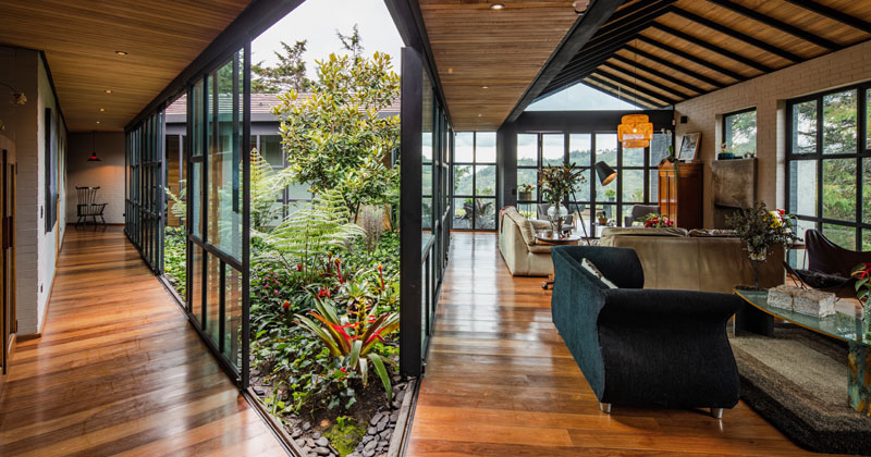 This Triangular Shaped House Makes Room For An Interior Garden