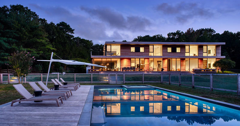 This Hamptons House Opens Up To An Expansive Yard With A Swimming Pool