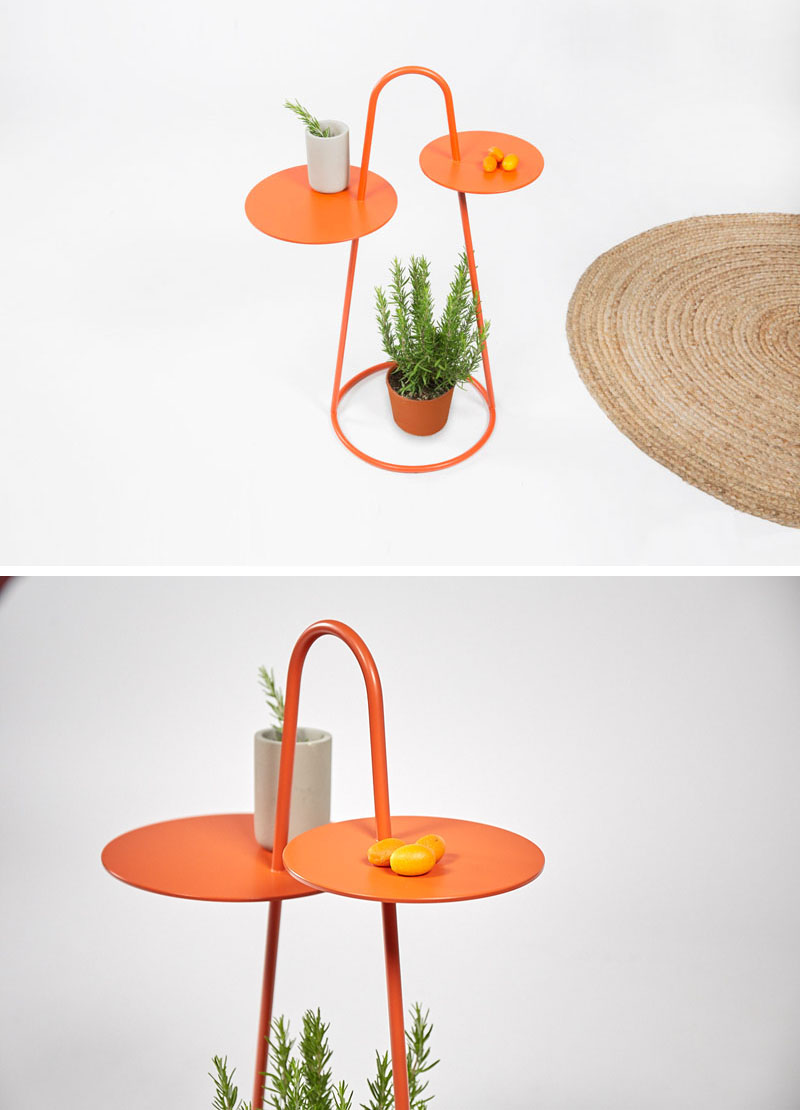 The Duet Side Table Has Two Surfaces Connected By A Curved Frame