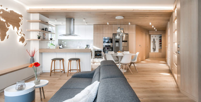 The Interior Of This Apartment Is Filled With Wood To Create A Warm And ...