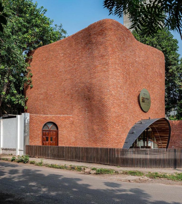 A Sweet Shop With A Curvaceous Brick Facade