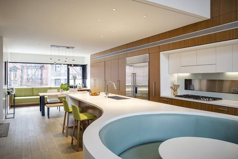 This Kitchen Island Was Combined With A Seating Area On One End