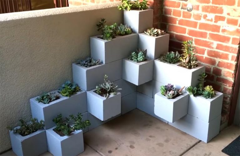 A Concrete Block Planter Wall Was Used To Add Greenery To This Restaurant