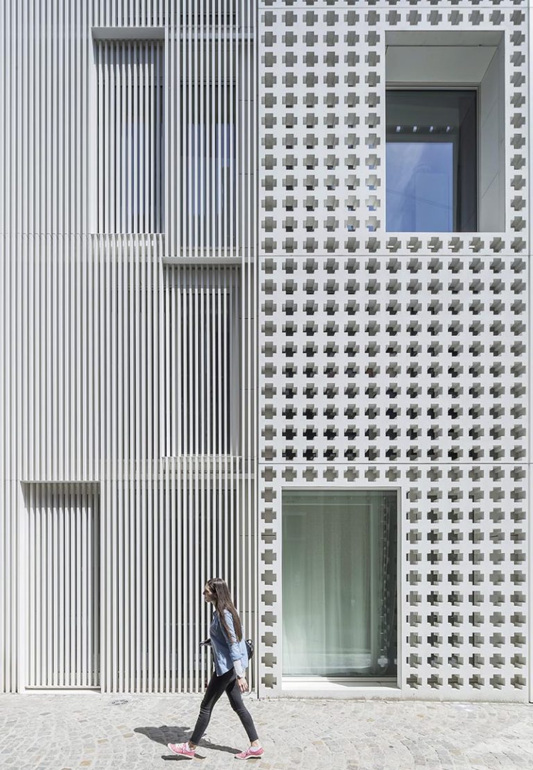 A Cross Pattern Covers This Facade Made From Precast Concrete