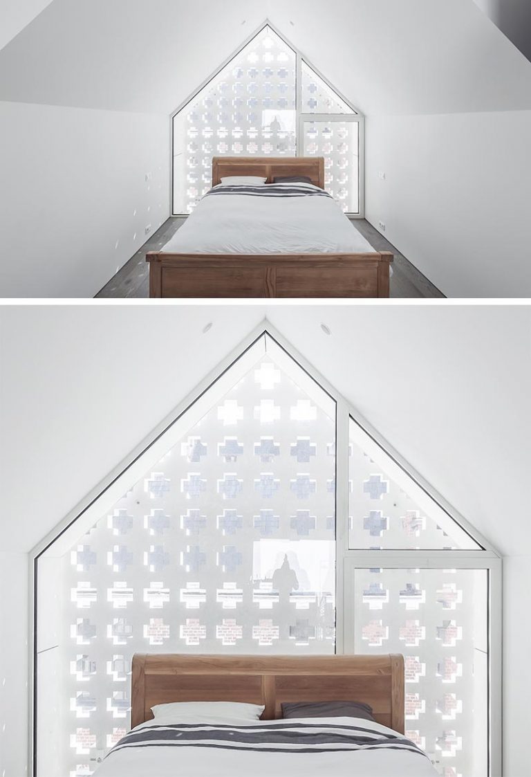 A Cross Pattern Covers This Facade Made From Precast Concrete