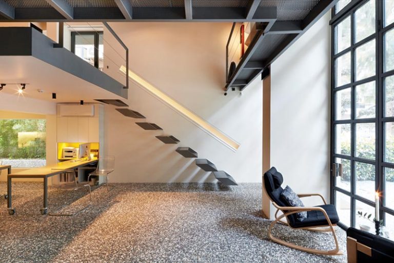 A Built-In Handrail With Hidden Lighting Guides People Up These ...