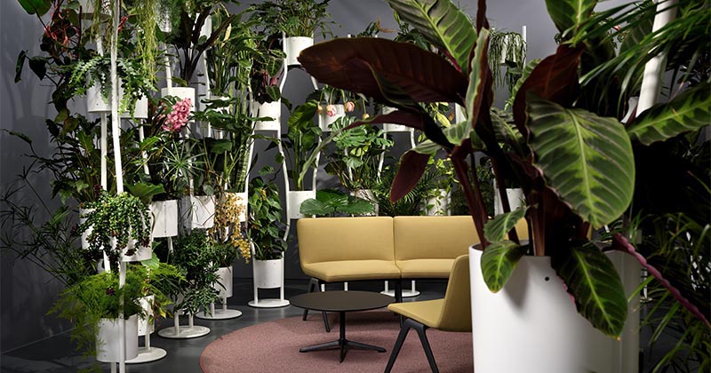 A Room Divider That Incorporates Plants Into Its Design